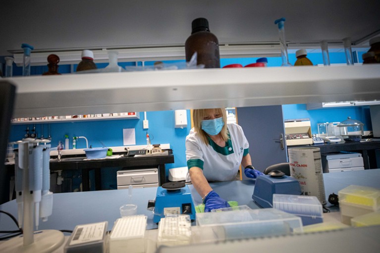 Return to the lab: scientists face shiftwork, masks and distancing as ...