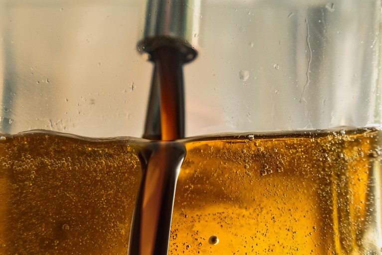 Tiny bubbles that break down fuel droplets for efficient combustion