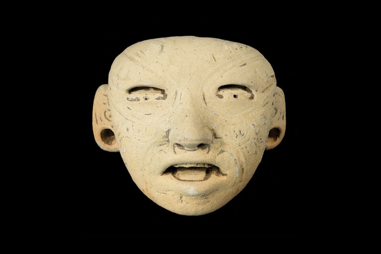 Ancient puppets that smile or scowl hint at shared rituals
